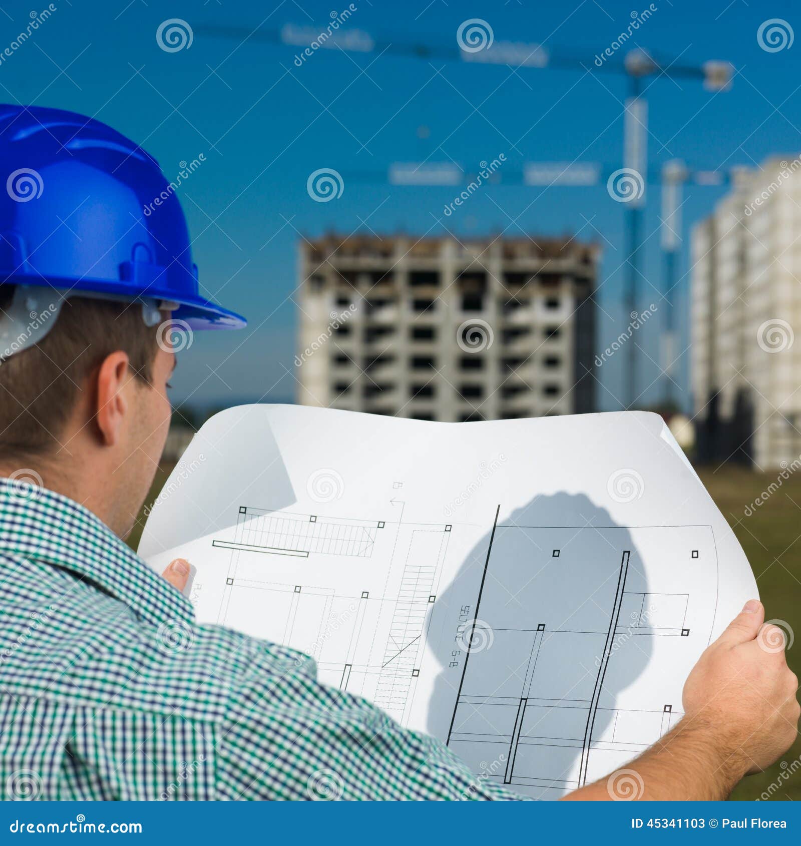 Engineer Reading Construction Plan Stock Image - Image of looking ...