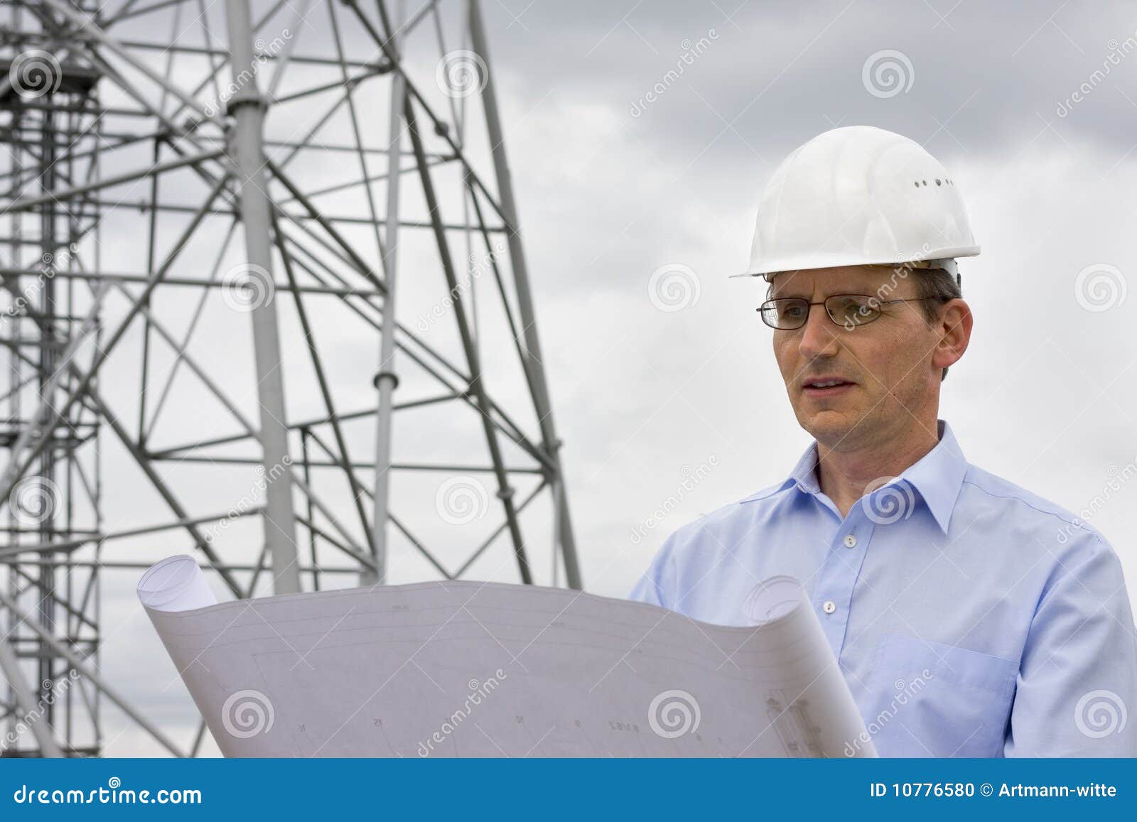 Engineer reading a plan stock photo. Image of gray, crane - 10776580