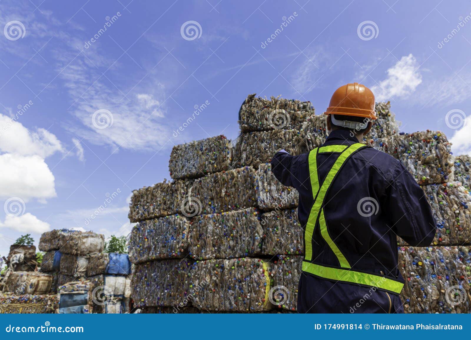 Engineer and Recyclable Material. an Engineer Looking at Recycling ...
