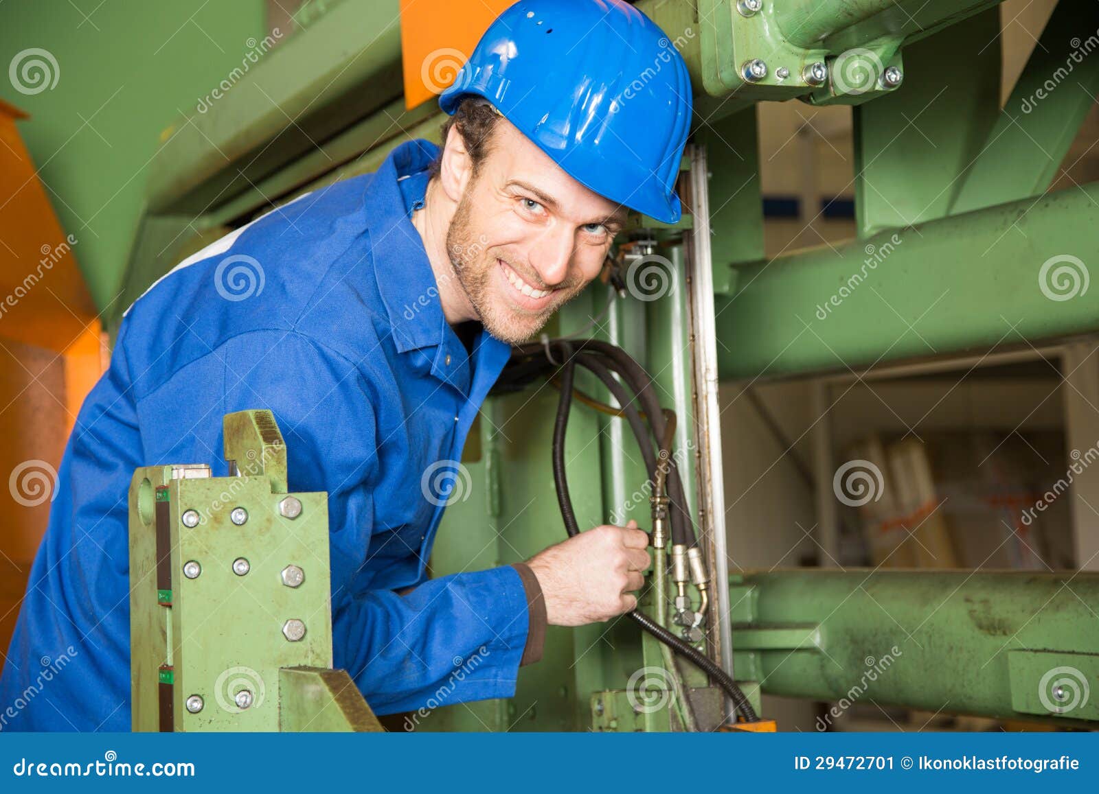 Engineer Repairing a Machine Stock Image - Image of building, handsome ...