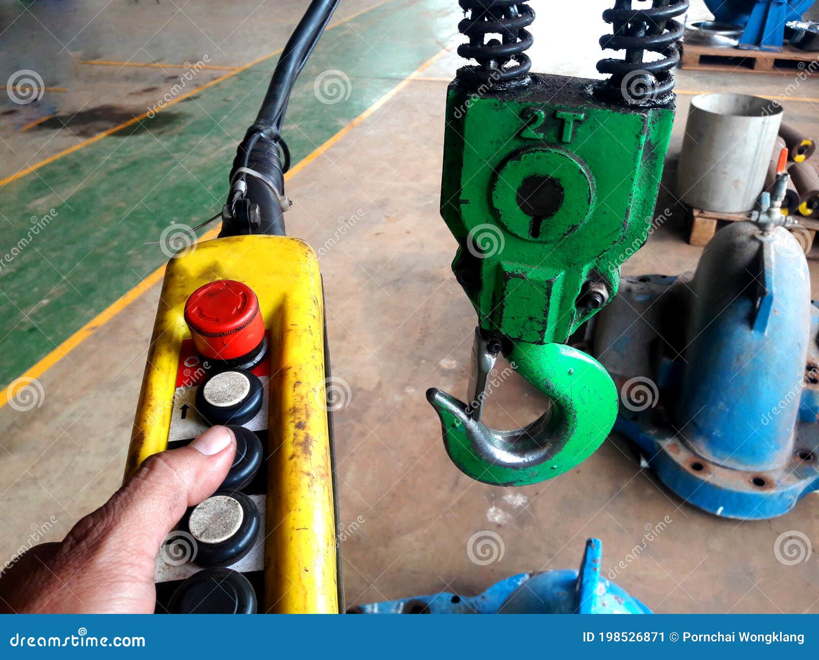 Engineer`s Hand Holding Overhead Cranes Remote In Maintenance Workshop ...