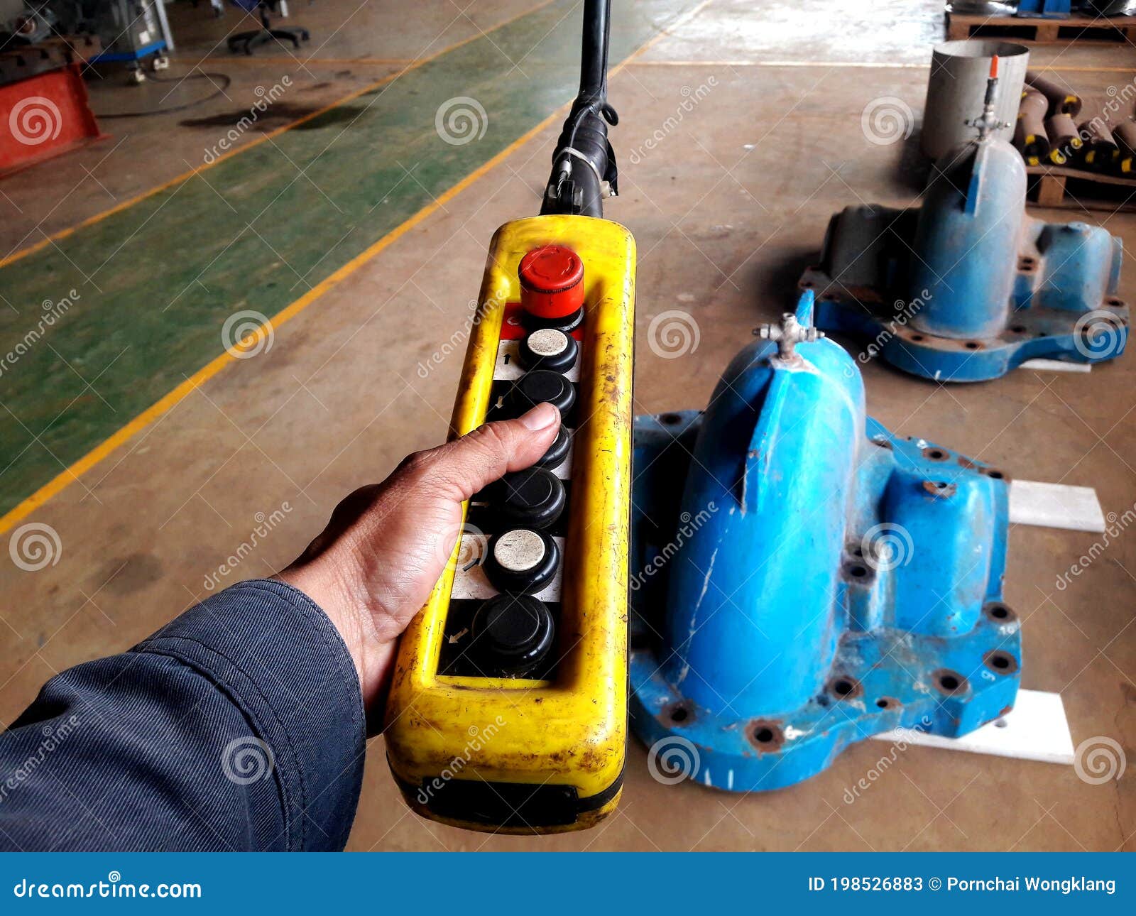 Engineer`s Hand Holding Overhead Cranes Remote in Maintenance Workshop ...