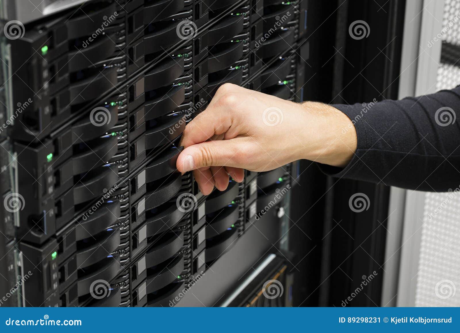 IT Engineer`s Hand Replacing Hard Drive In Data Center Royalty-Free ...