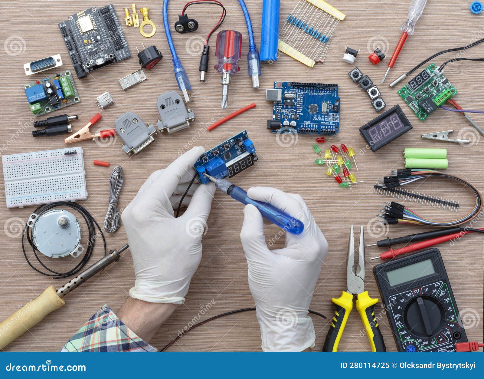 An Engineer S Hands Are Assembling A Breadboard From An Arduino Microcontroller Stock Image