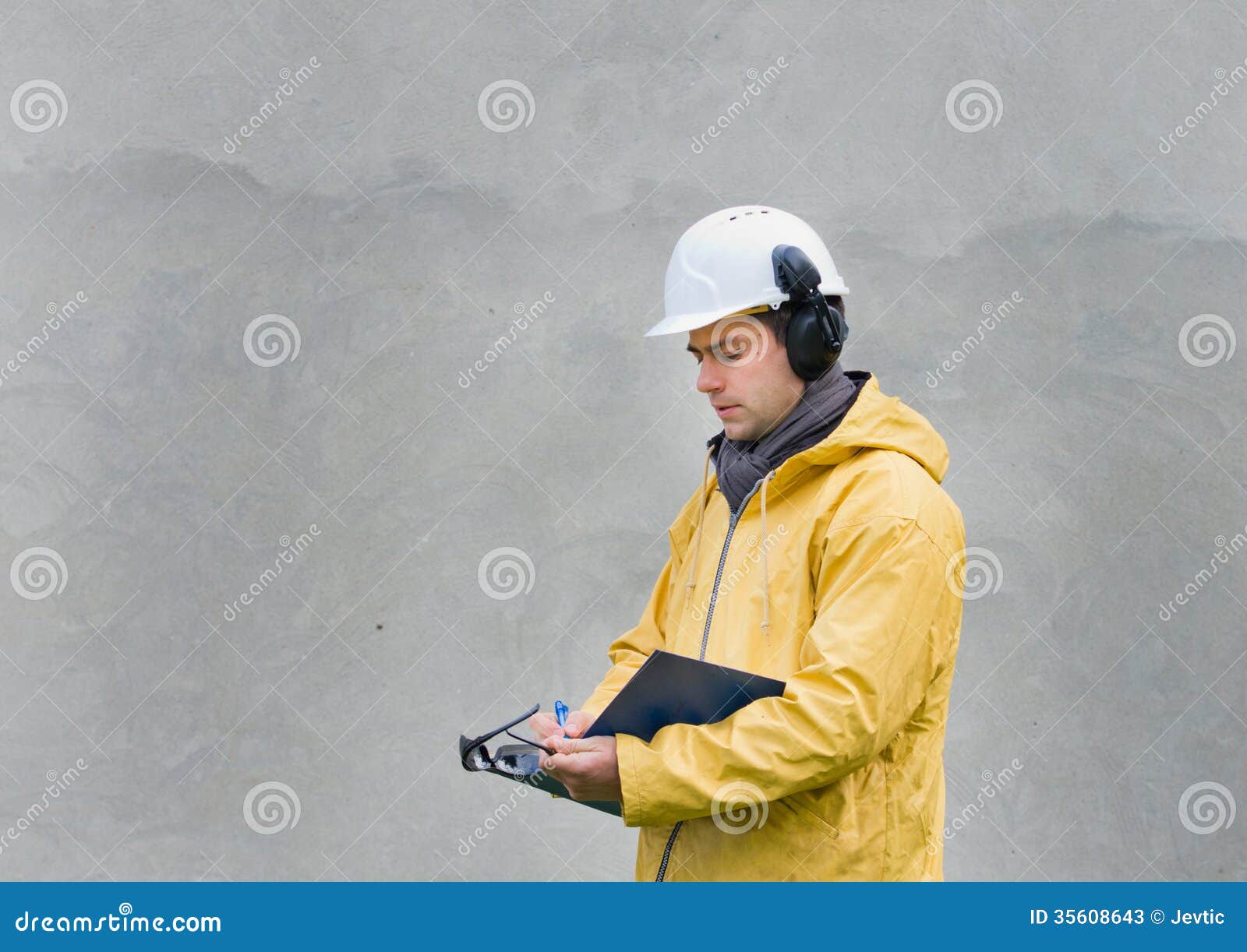 Engineer in safety suit stock image. Image of handsome - 35608643