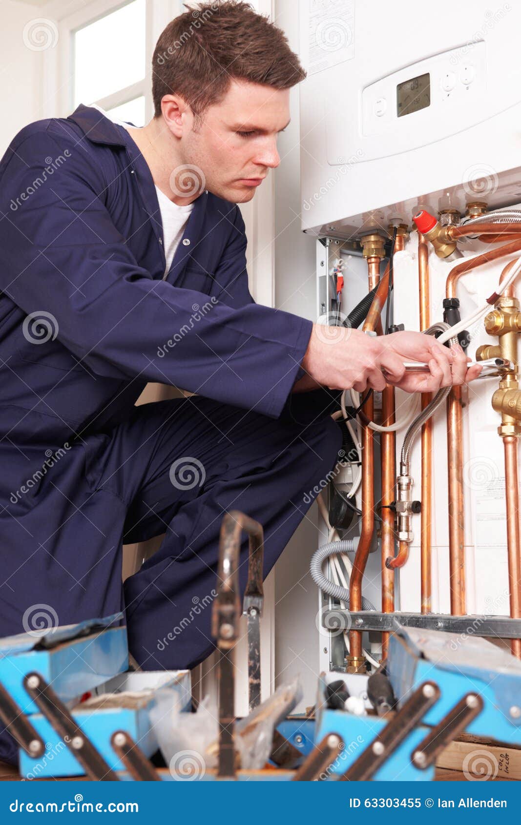 Engineer Servicing Central Heating Boiler Stock Image - Image of ...