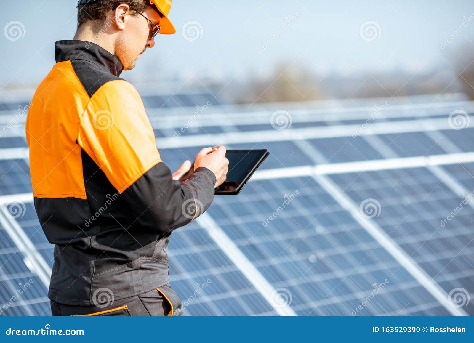 Engineer Servicing Solar Panel on Electric Plant Stock Photo - Image of ...