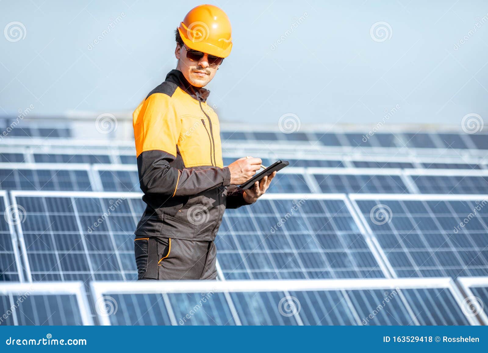 Engineer Servicing Solar Panel on Electric Plant Stock Photo - Image of ...