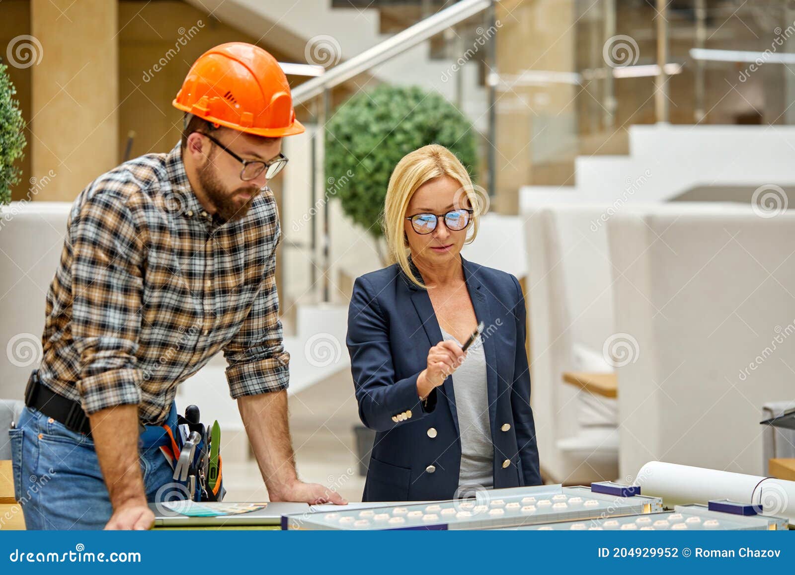 Engineer Show Plan for House Building To Female Director of Company ...