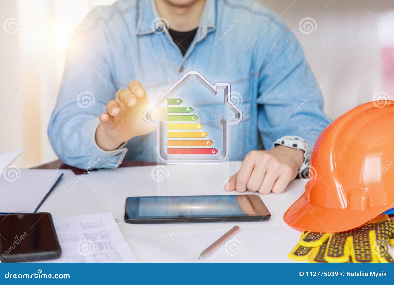 Engineer Showing a Model Energy-efficient House . Stock Image - Image ...