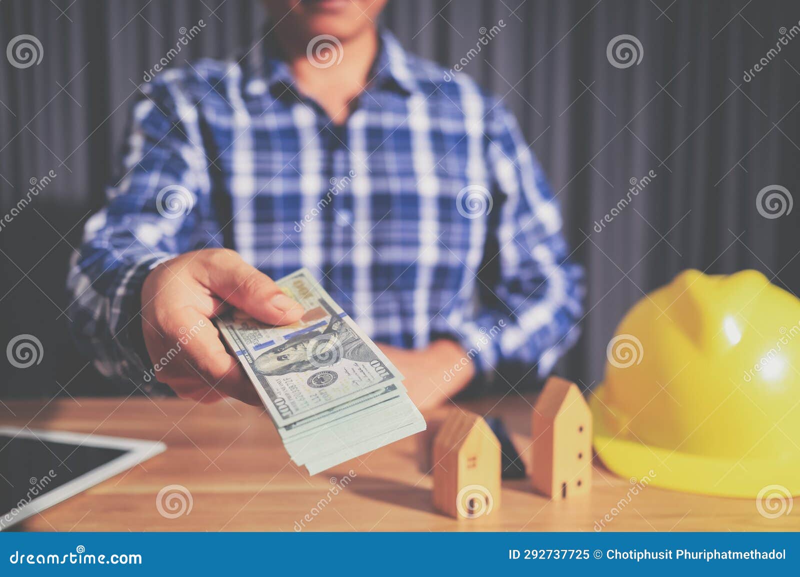 Engineer Sitting and Counting Dollar Bills. Stock Image - Image of ...