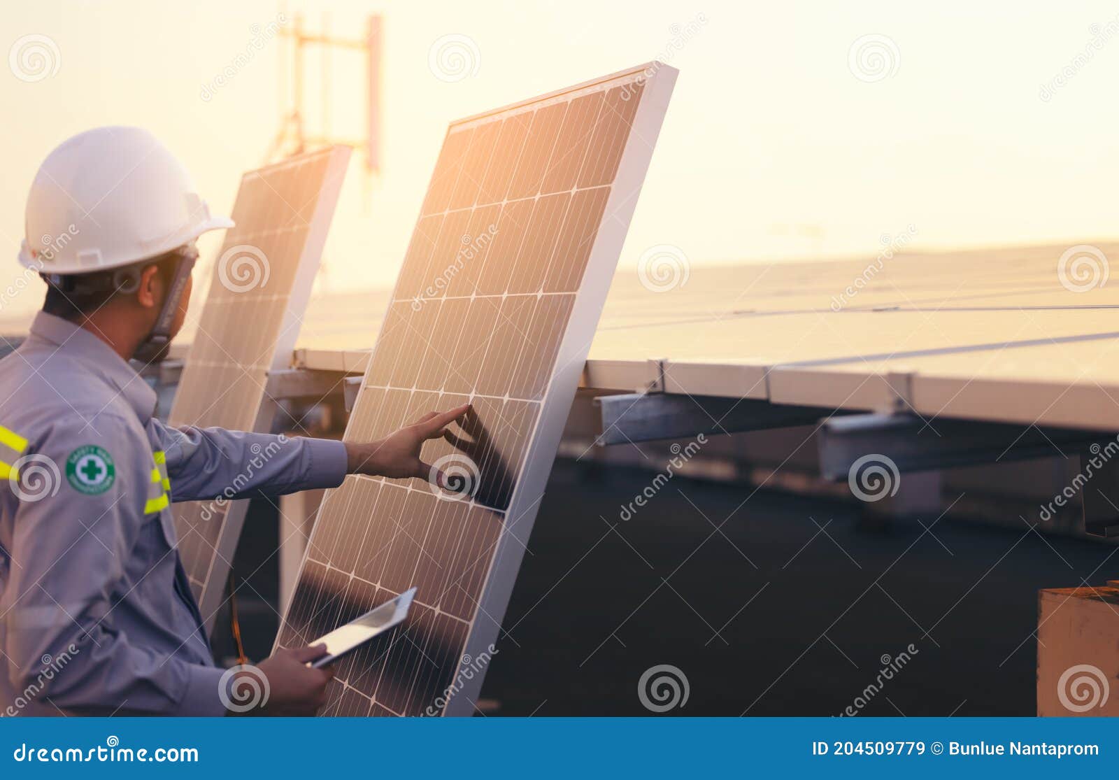 Engineer In Solar Power Plant Working On Installing Solar Panel ; Smart ...