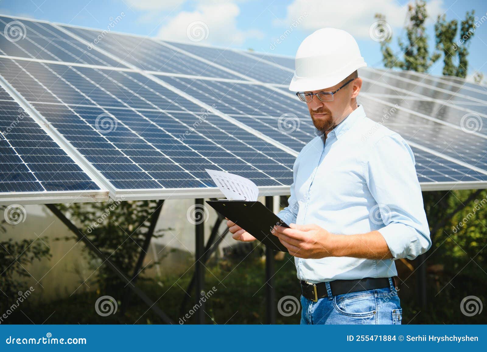 Engineer at Solar Power Station with Solar Panel. Practical Lessons on ...