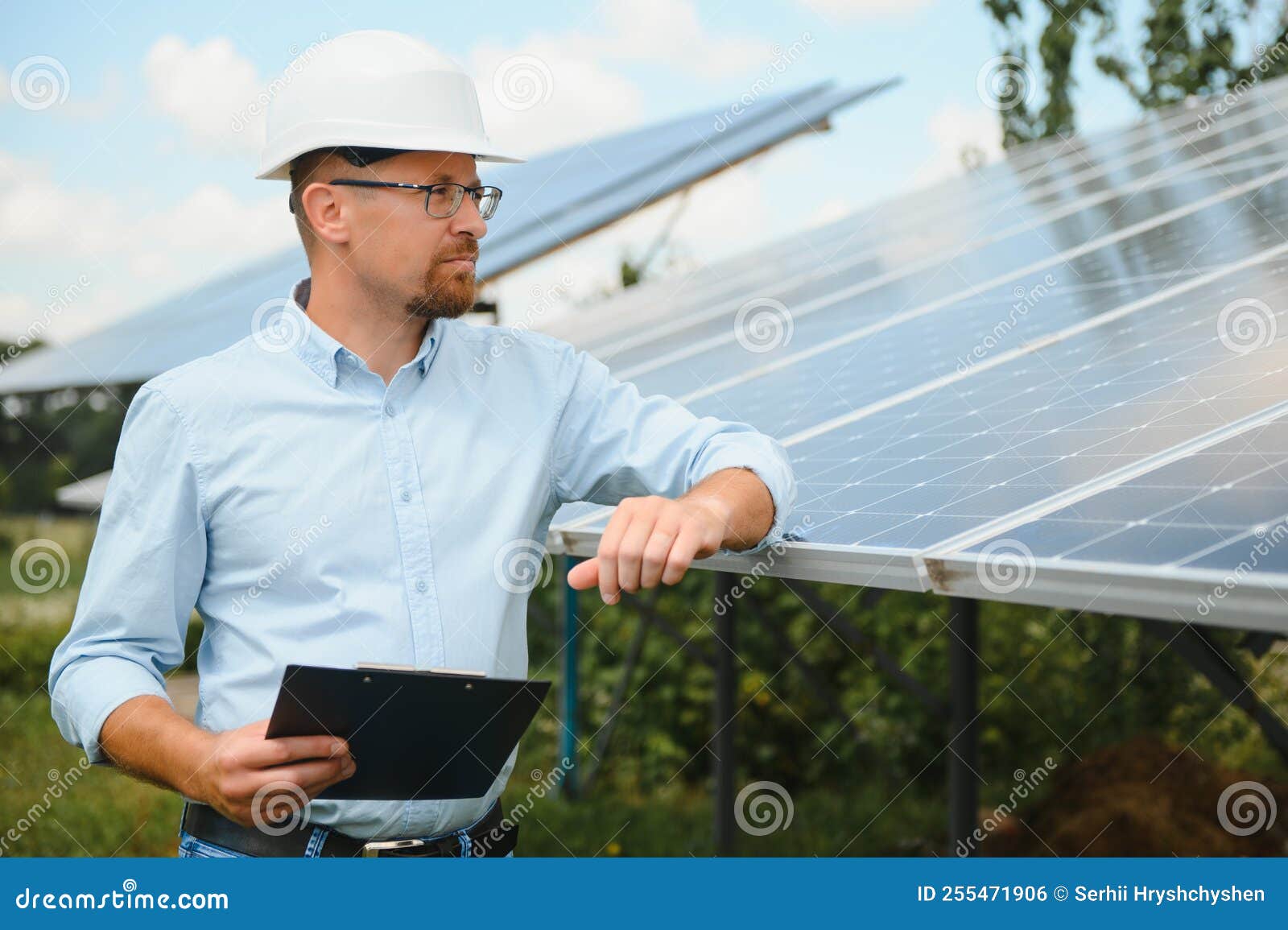 Engineer at Solar Power Station with Solar Panel. Practical Lessons on ...
