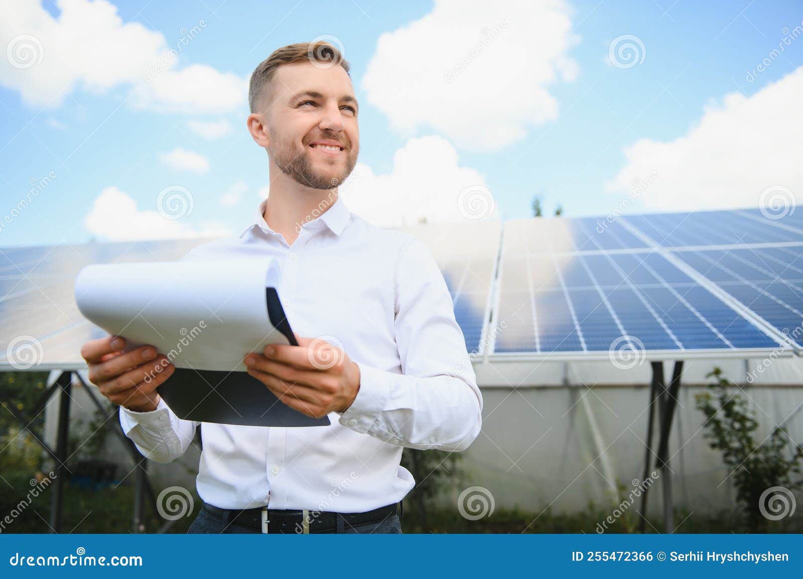 Engineer at Solar Power Station with Solar Panel. Practical Lessons on ...