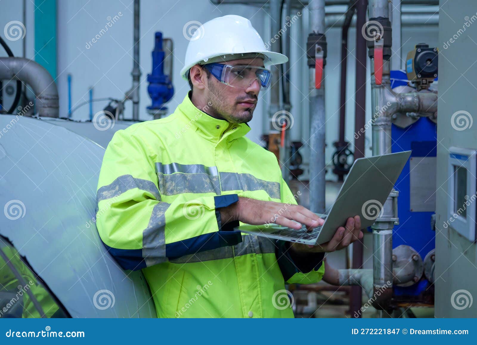 Engineer Specialist Using Laptop Checking and Maintaining Machine in ...
