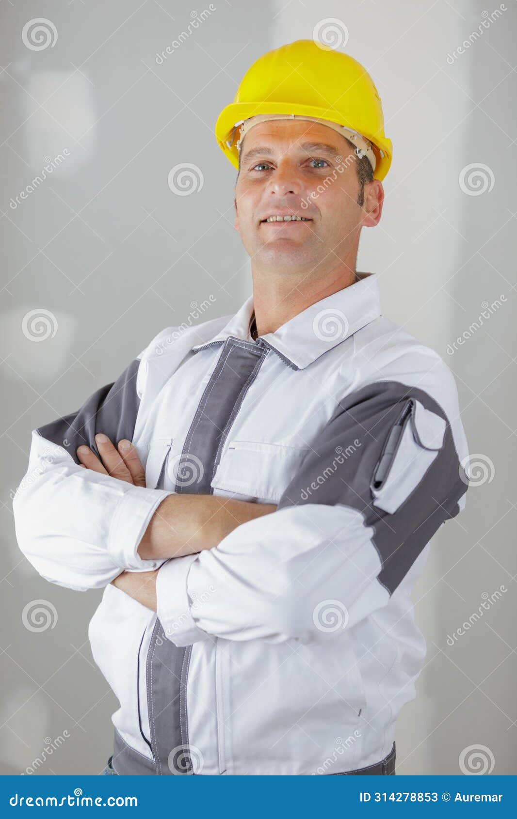 Engineer Standing Confidently with Crossed Arms Stock Image - Image of ...