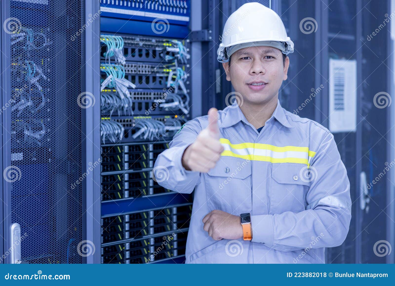 It Engineer Standing and Posing with Crossed Arms in a Working Data ...