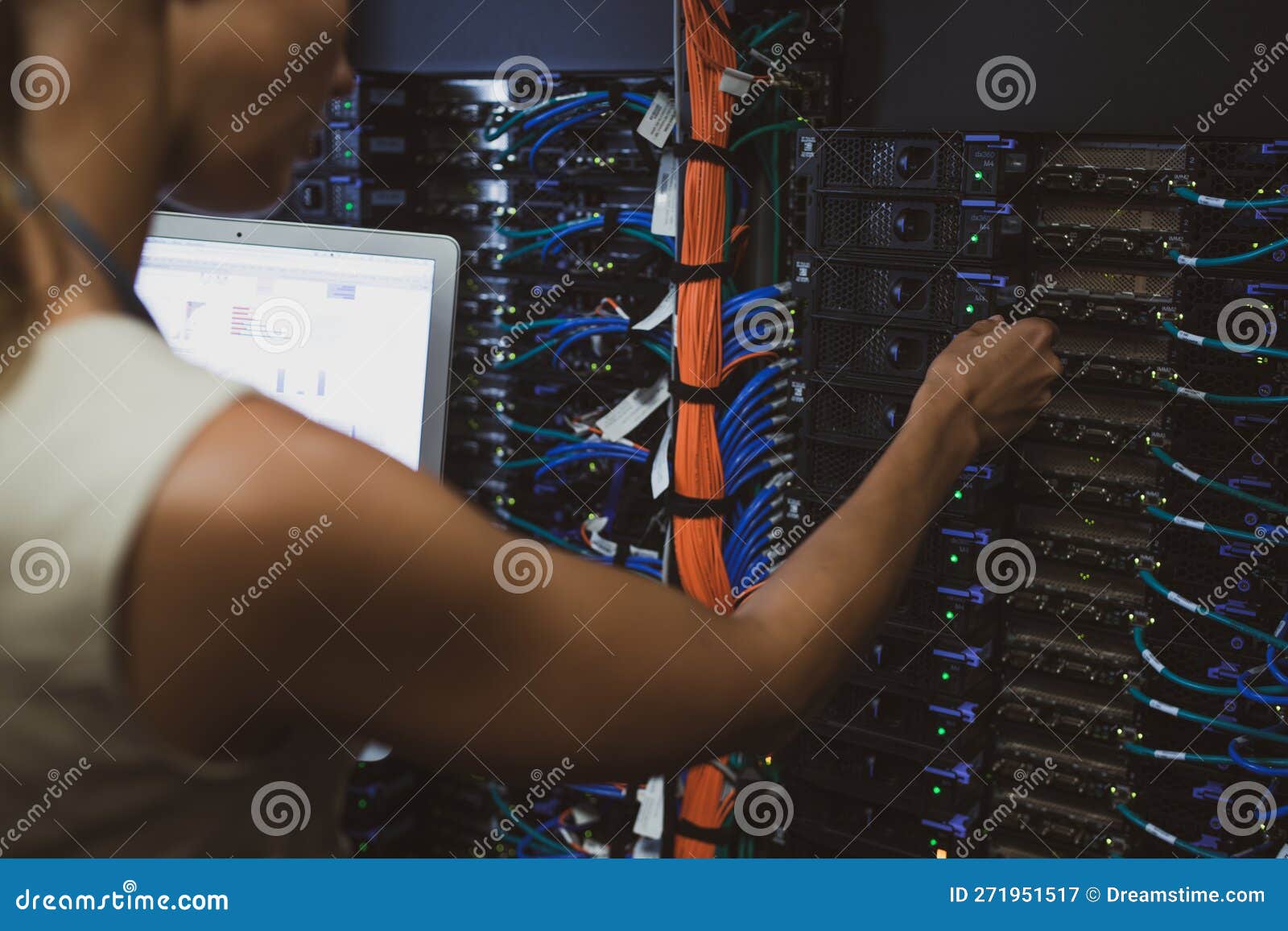 It Engineer Standing before Working Server Rack Doing Diagnostics Using ...
