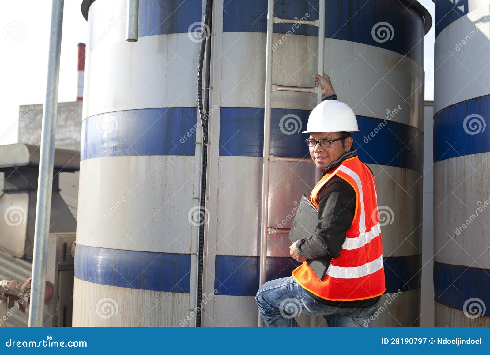 Engineer and storage tank stock image. Image of construction - 28190797