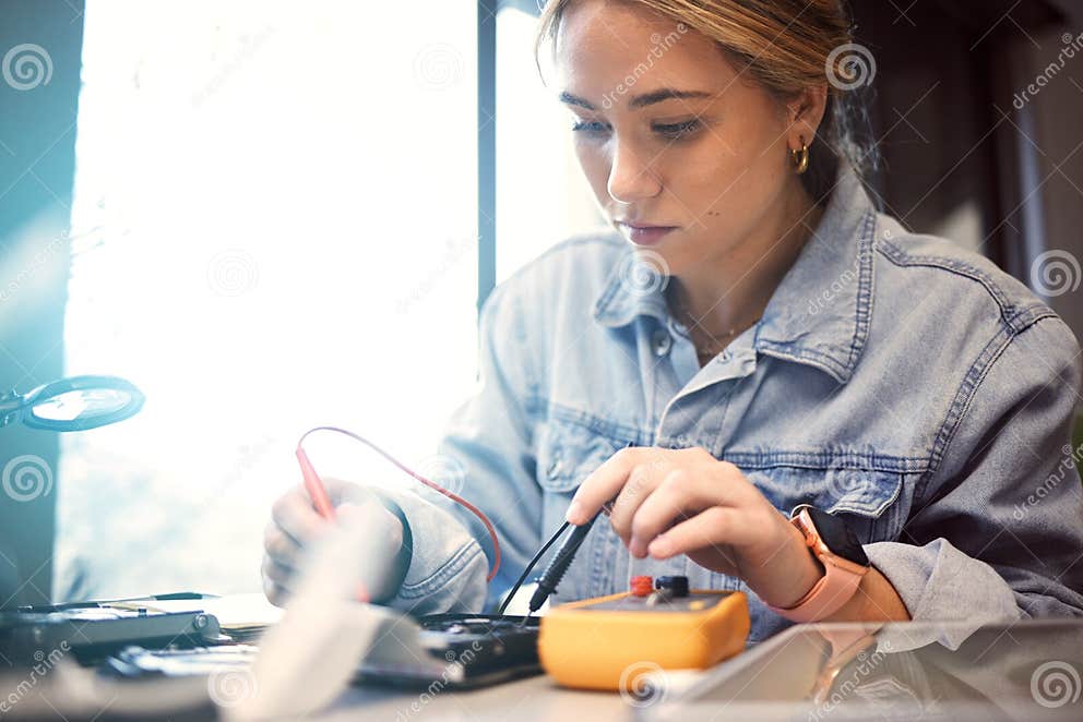 Engineer, Student and Woman Repair Electronics for Science Project ...