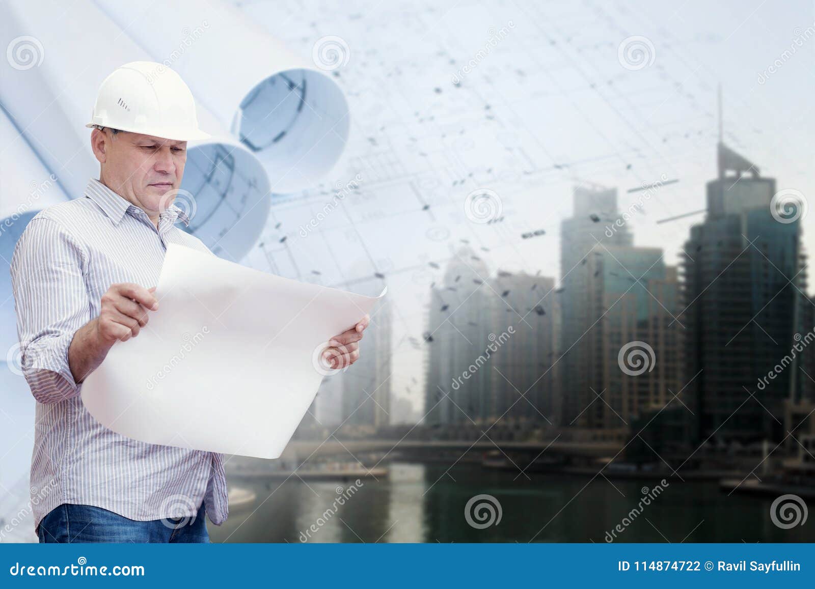 An Engineer Study Blueprints Against Urban Background Stock Photo ...