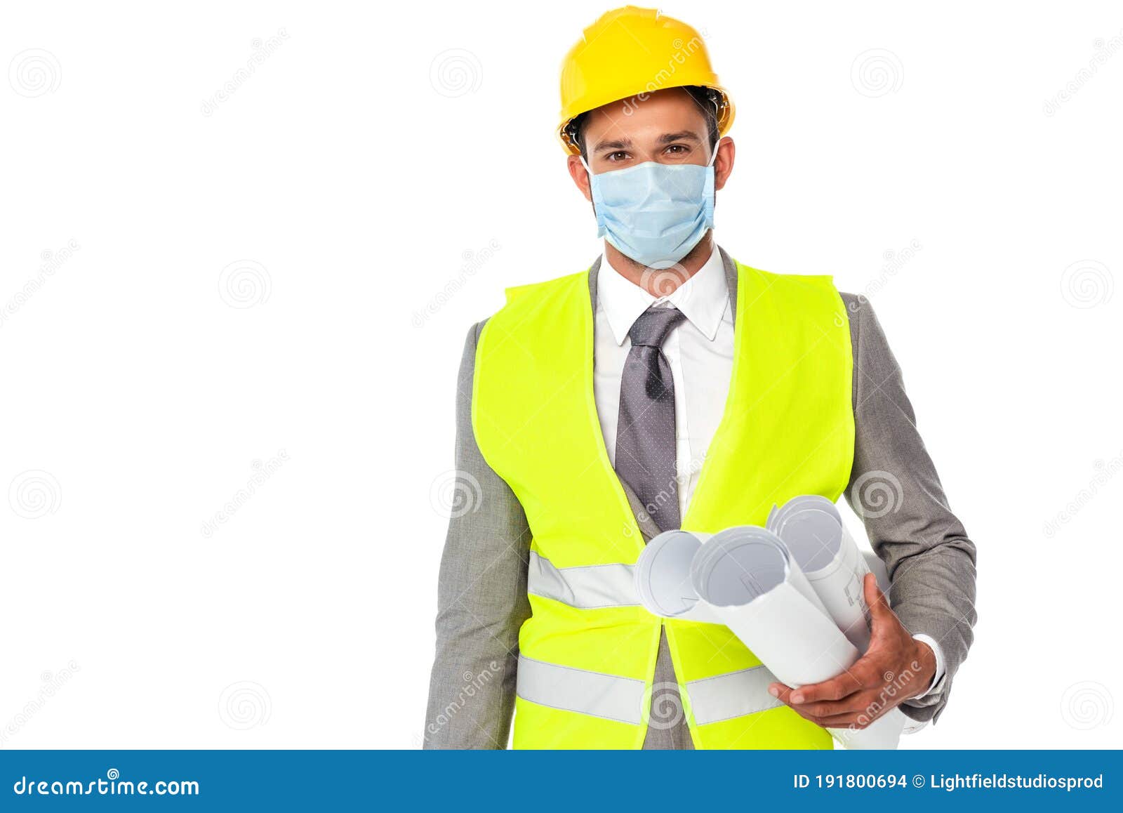 Engineer in Suit and Hardhat Holding Blueprints and Looking at Camera ...