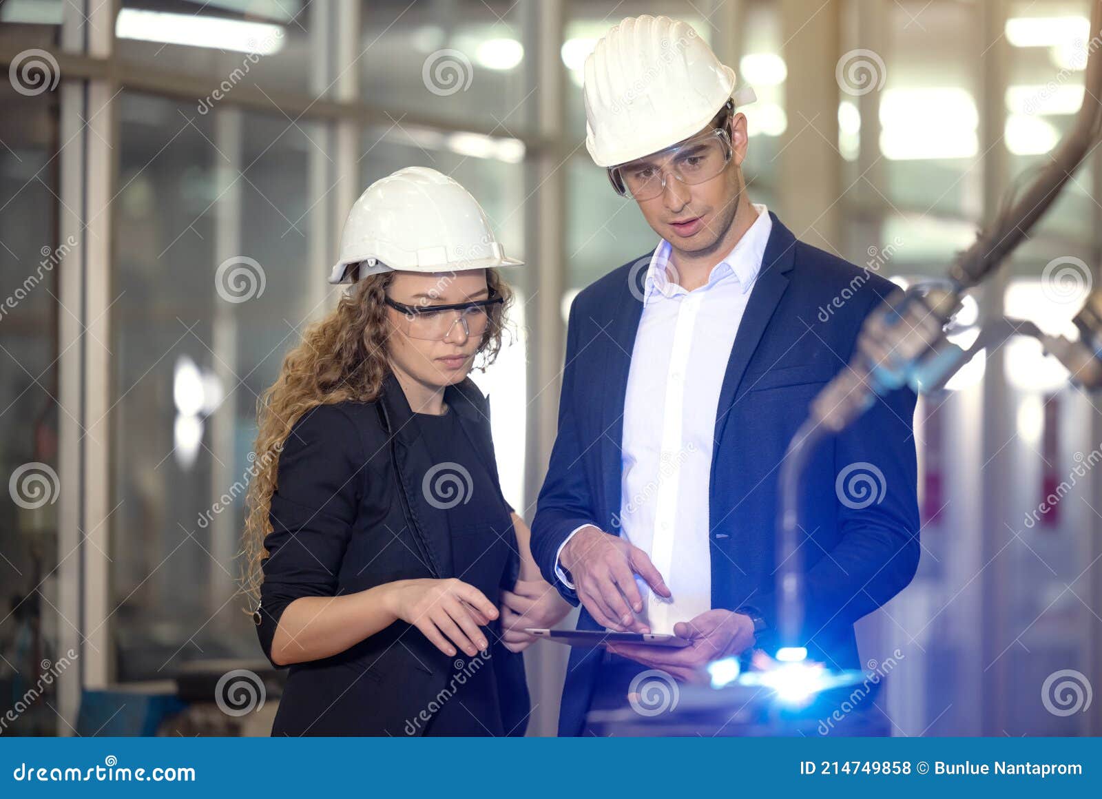 Engineer Supervising Autonomous Producton Process Industry Robot Arm in ...