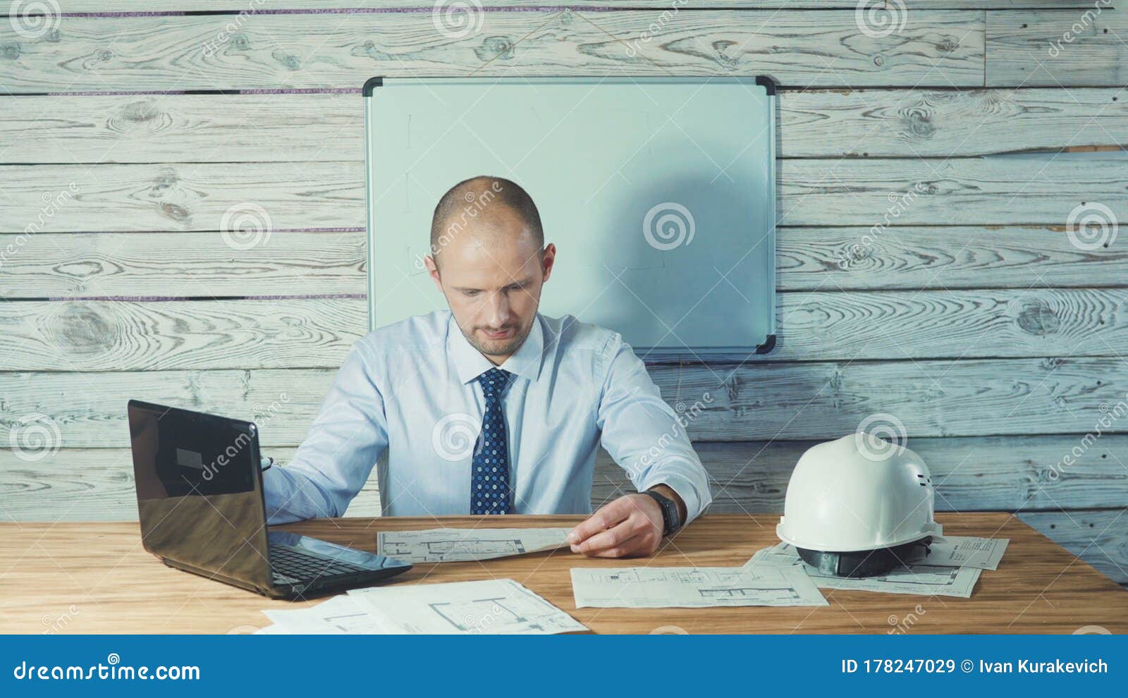 Engineer Supervisor Working on Drawings in the Office. Stock Image ...