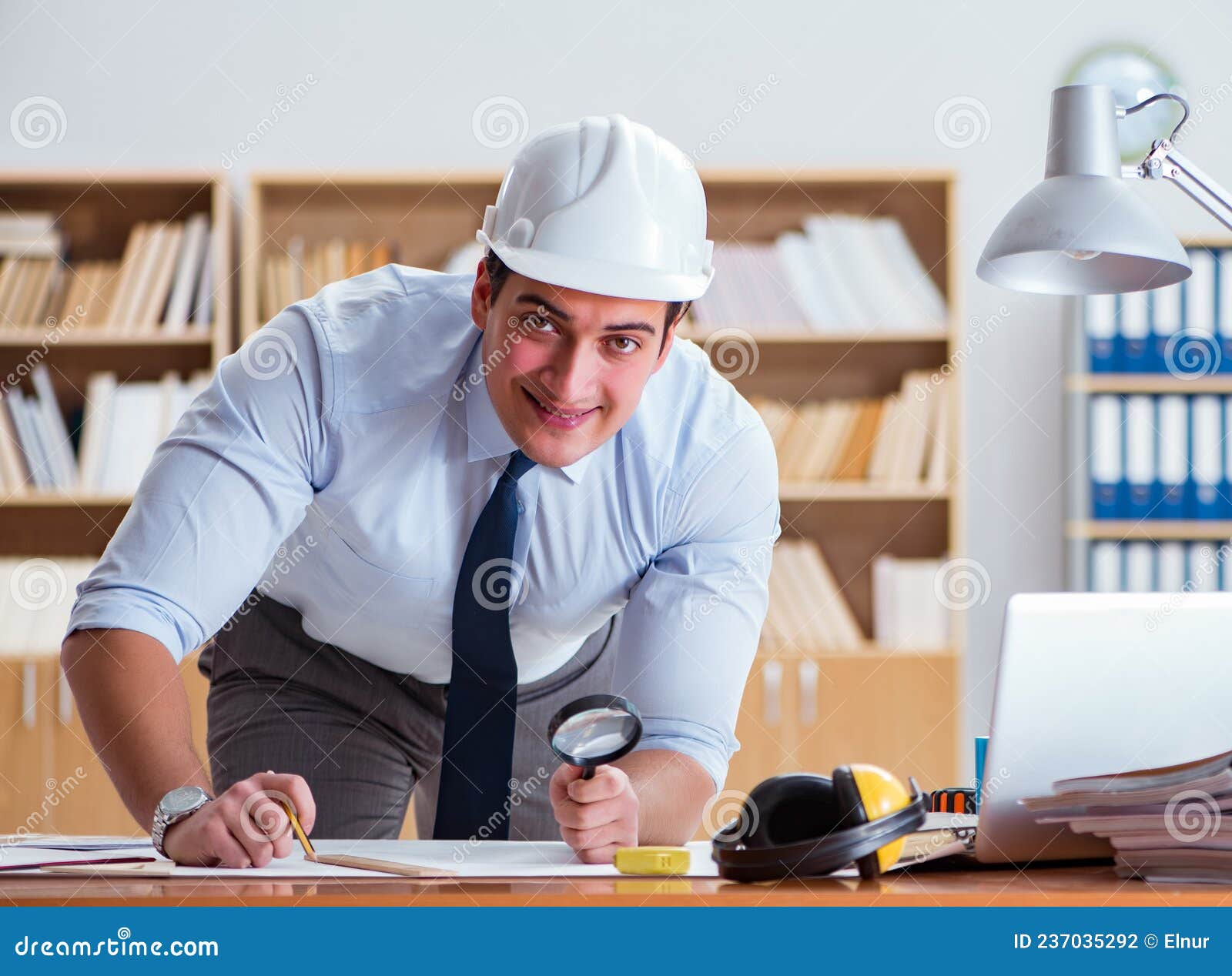 Engineer Supervisor Working on Drawings in the Office Stock Photo ...