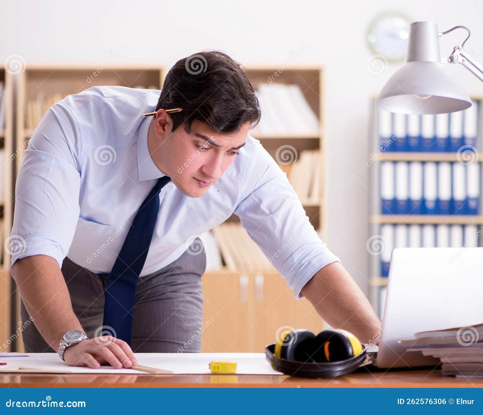 Engineer Supervisor Working on Drawings in the Office Stock Photo ...
