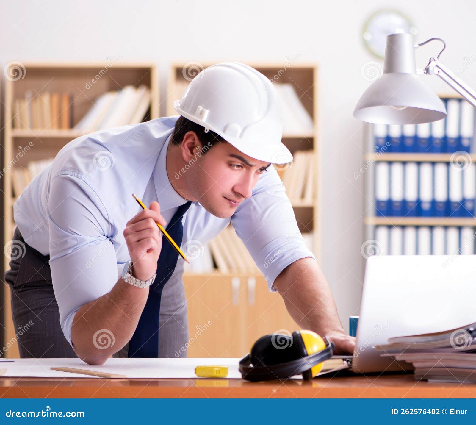 Engineer Supervisor Working on Drawings in the Office Stock Photo ...