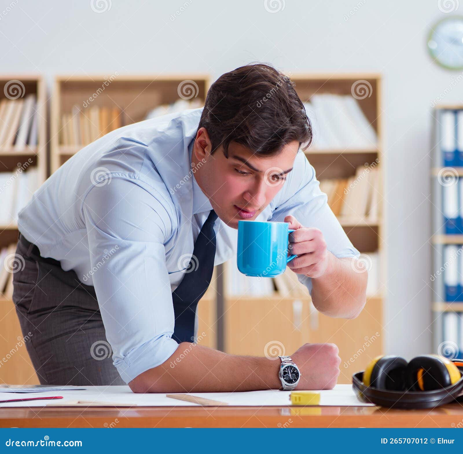 Engineer Supervisor Working on Drawings in the Office Stock Photo ...