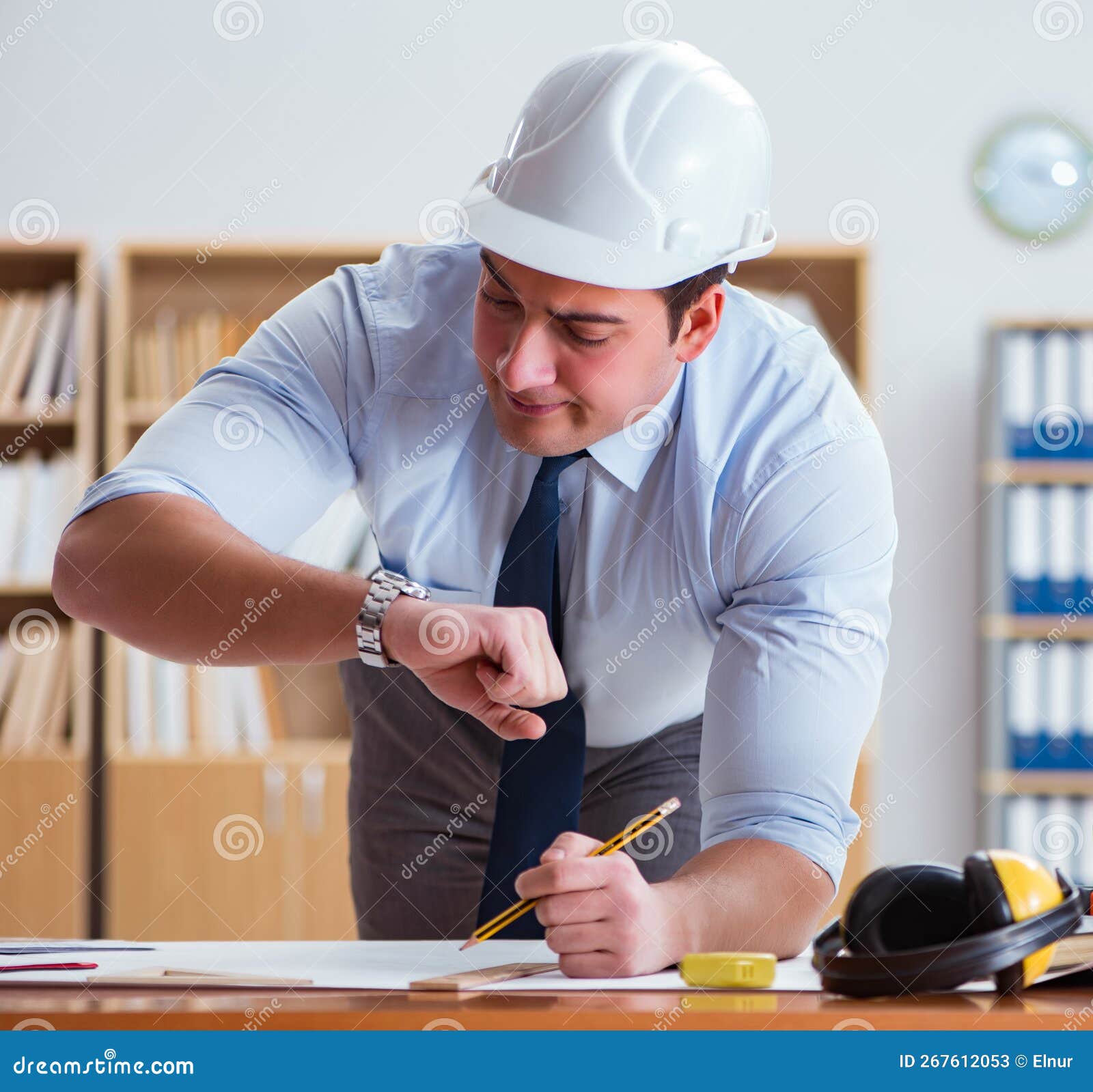 Engineer Supervisor Working on Drawings in the Office Stock Image ...