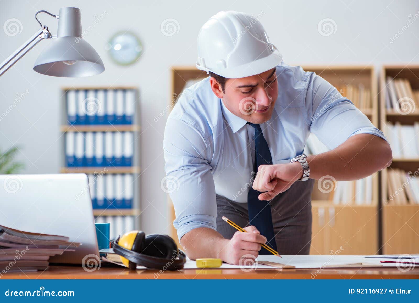 The Engineer Supervisor Working on Drawings in the Office Stock Image ...