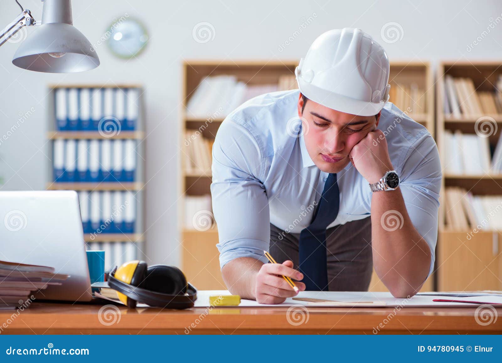 The Engineer Supervisor Working on Drawings in the Office Stock Image ...