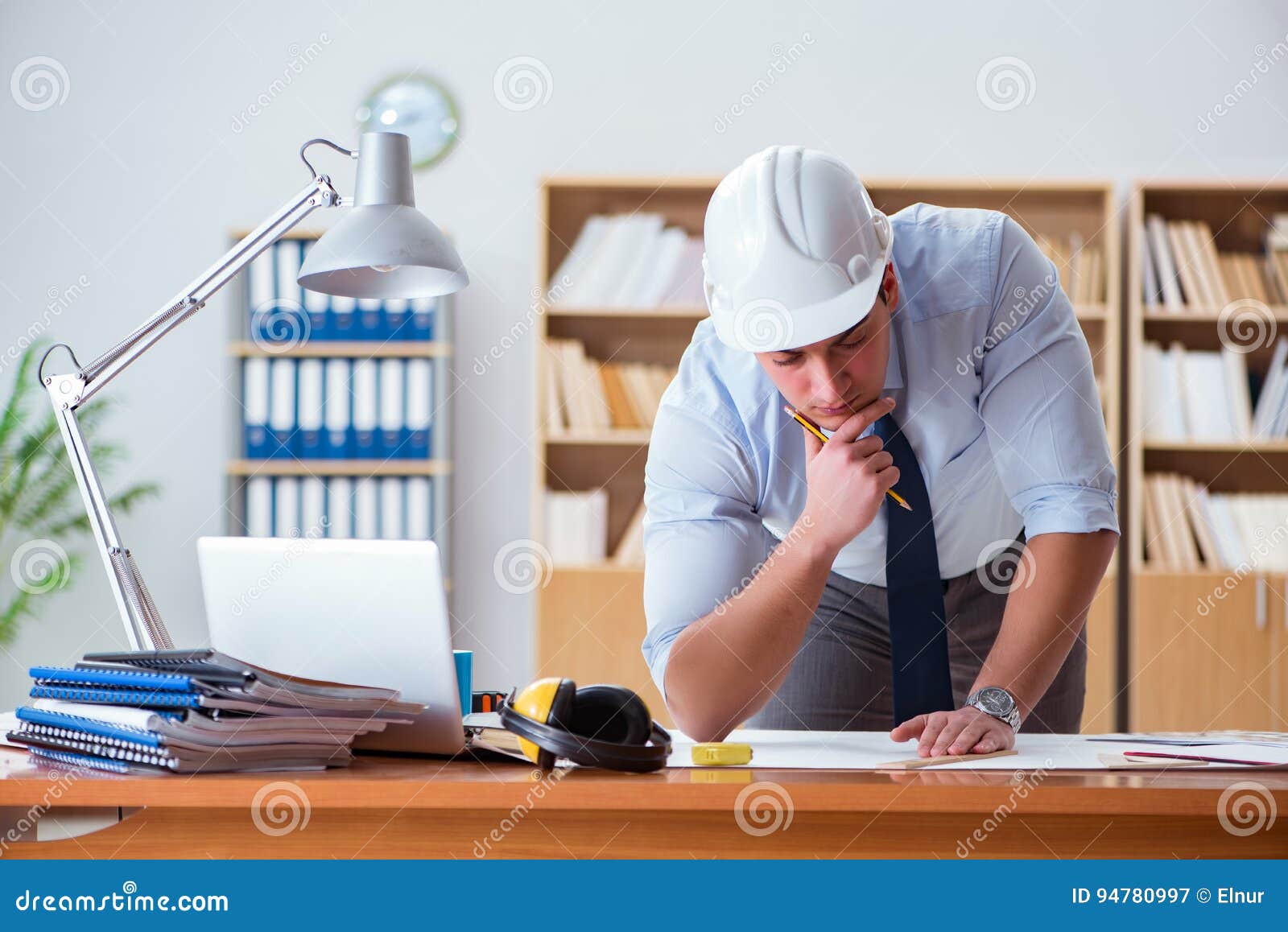 The Engineer Supervisor Working on Drawings in the Office Stock Image ...