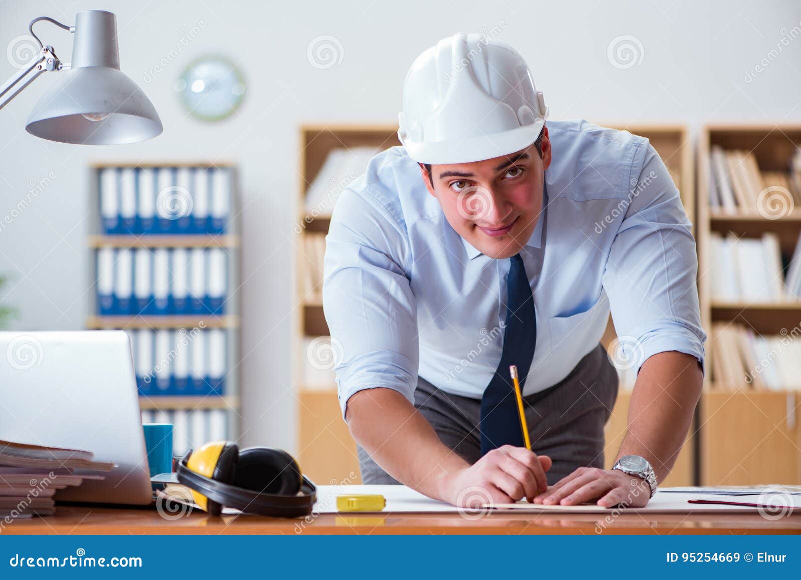 The Engineer Supervisor Working on Drawings in the Office Stock Image ...
