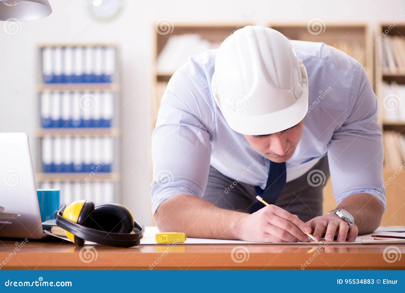 The Engineer Supervisor Working on Drawings in the Office Stock Image ...