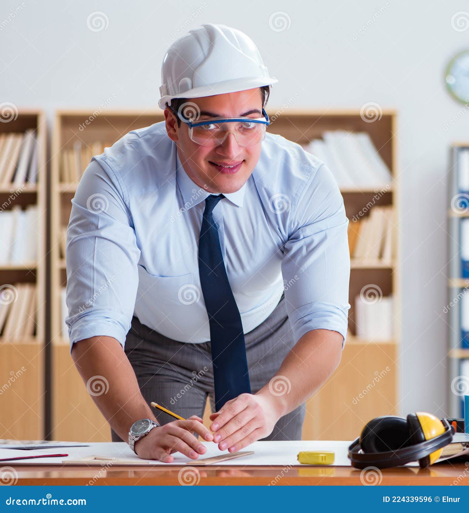 Engineer Supervisor Working on Drawings in the Office Stock Photo ...