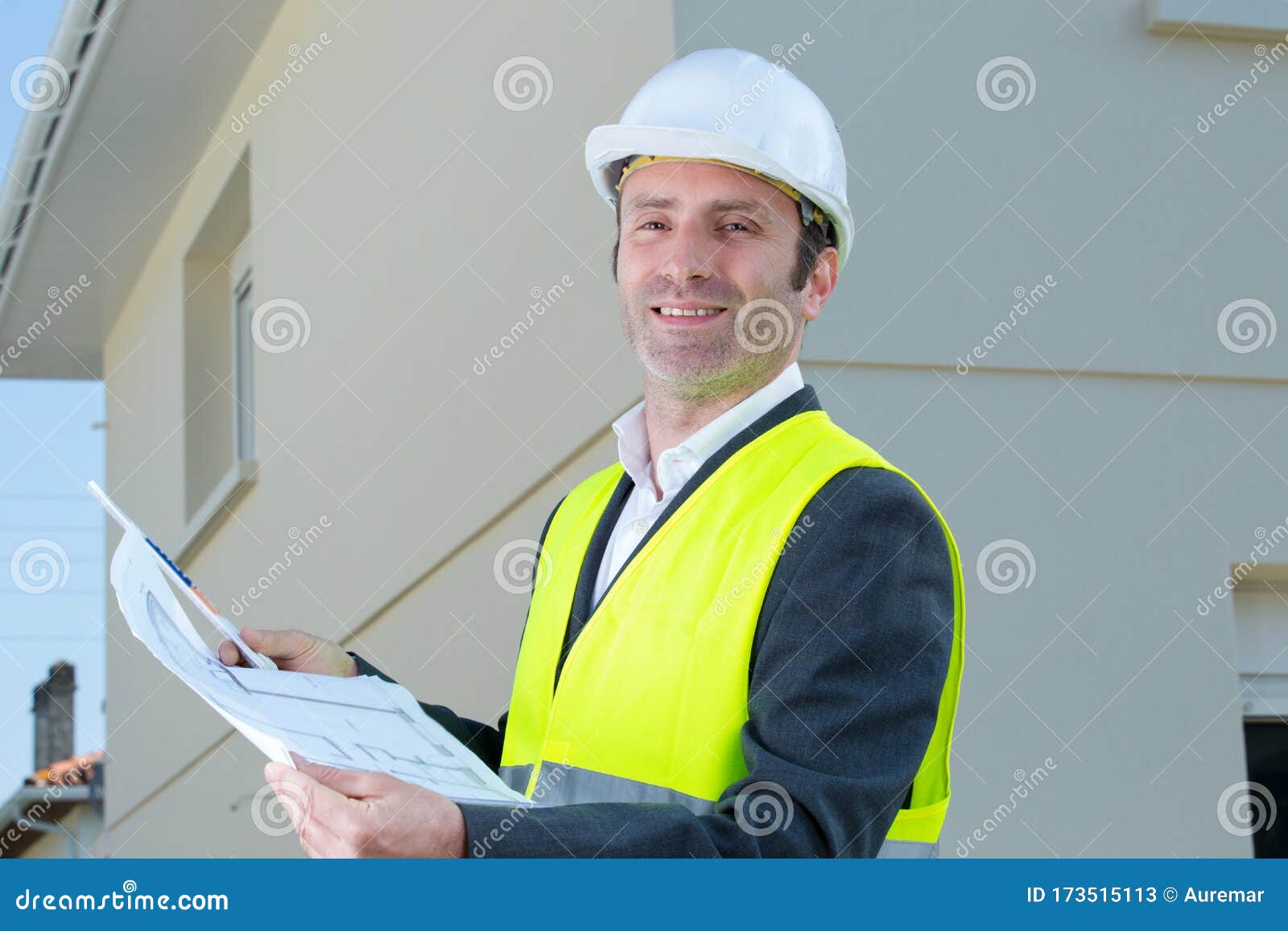 Engineer Surveying Land Using Blueprint To Plan Work Stock Image ...