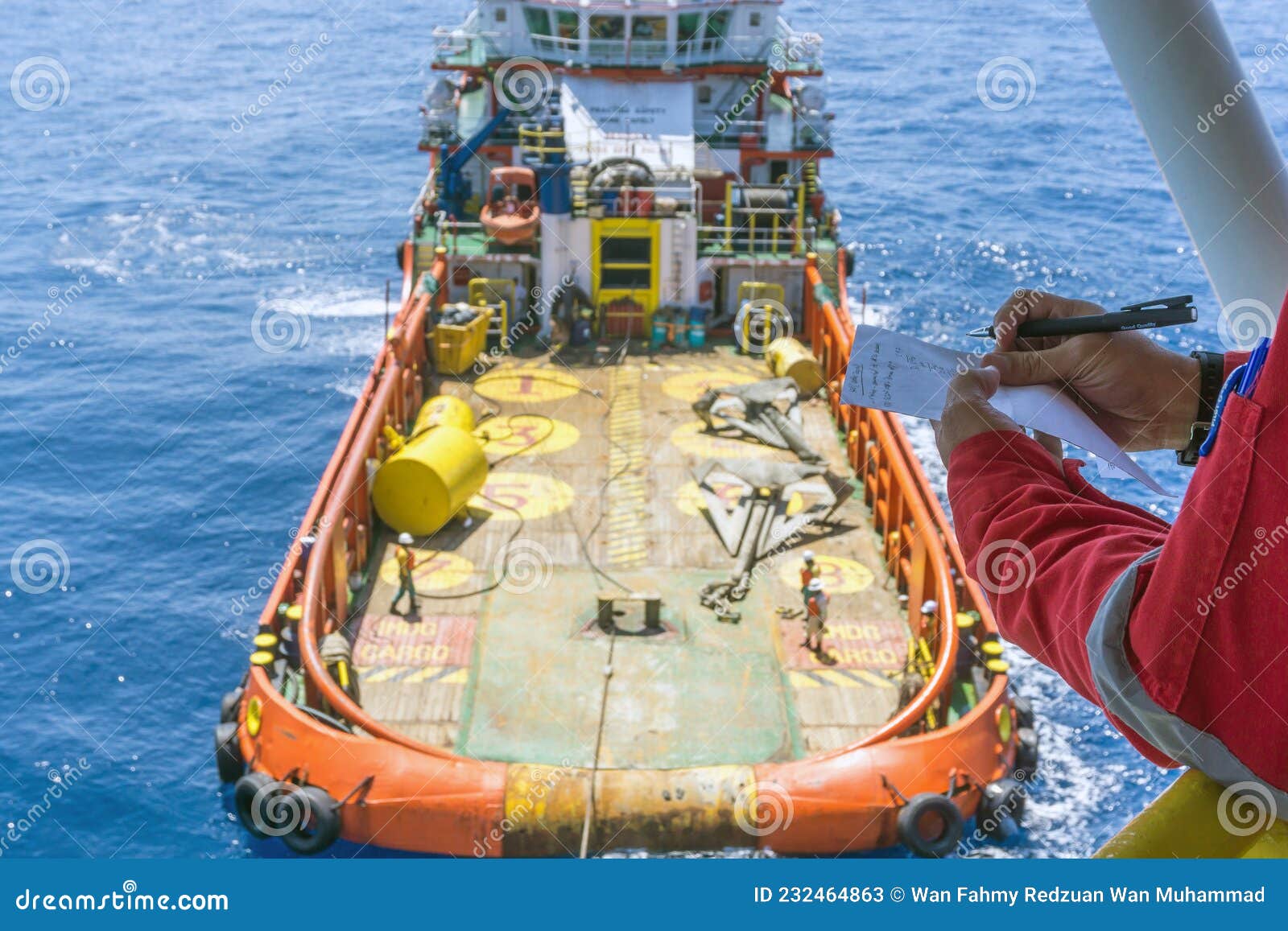 An Anchor Handling Tug Boat Performing Anchor Deployment at Offshore ...