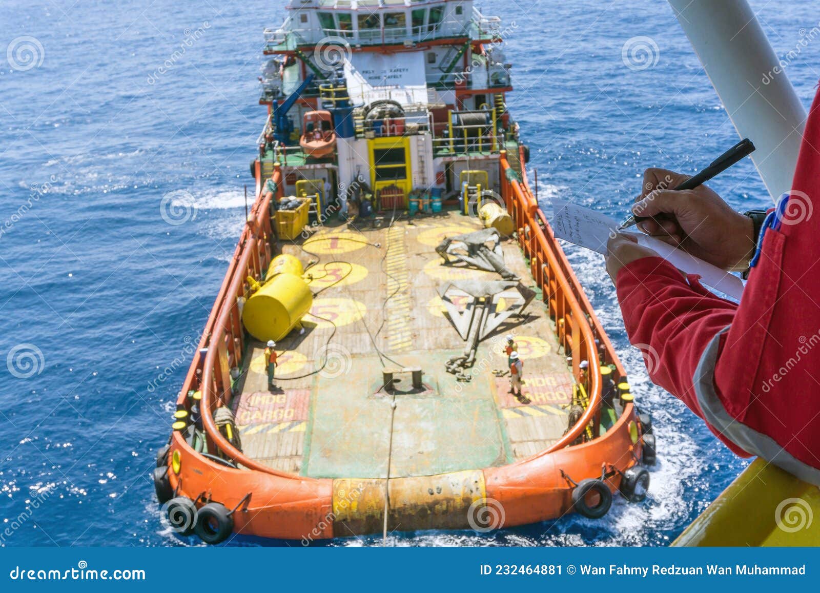 An Anchor Handling Tug Boat Performing Anchor Deployment at Offshore ...
