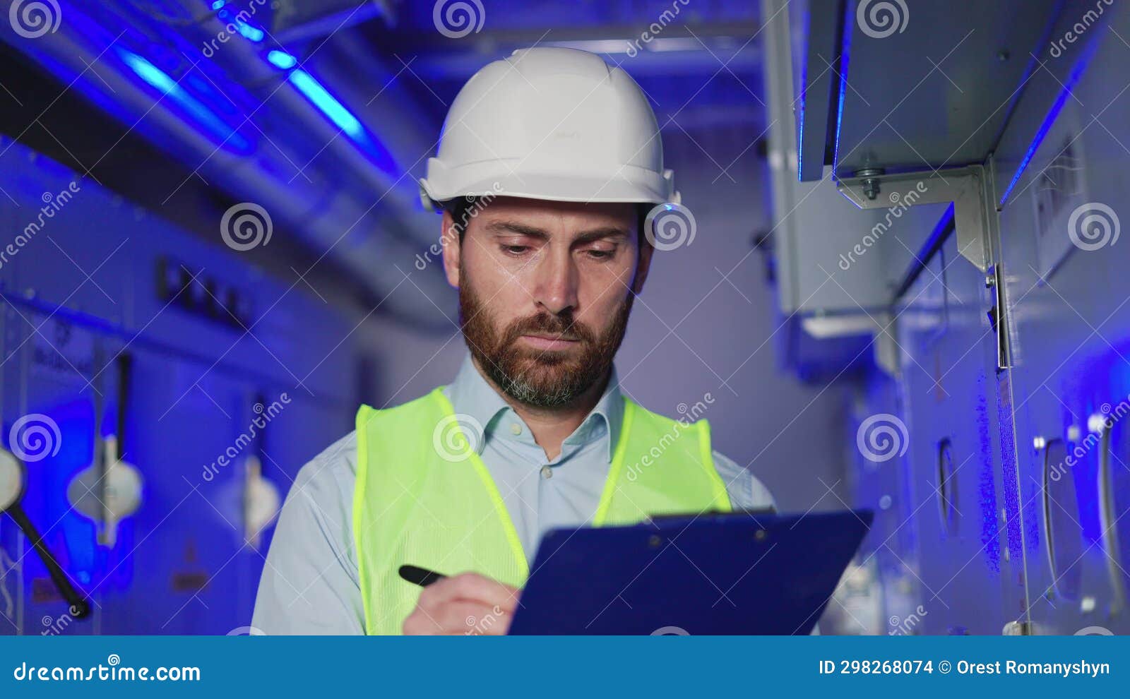 Engineer Taking Notes at Substation Checking Meter Data Factory ...