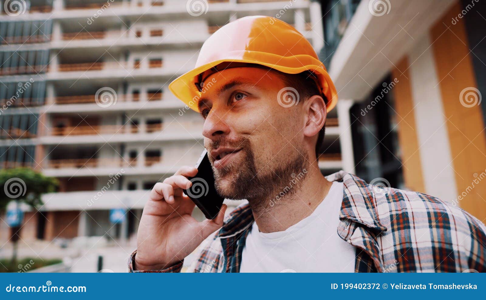 Engineer Talking on Phone. Architect Using Phone on Construction Site ...