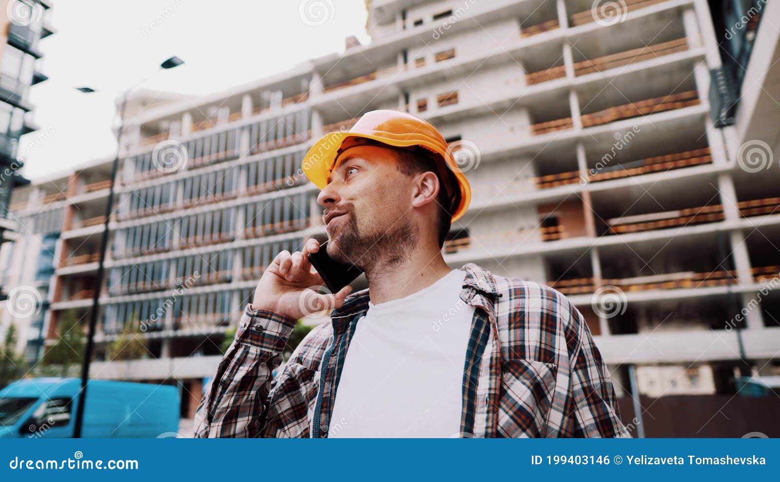 Engineer Talking on Phone. Architect Using Phone on Construction Site ...