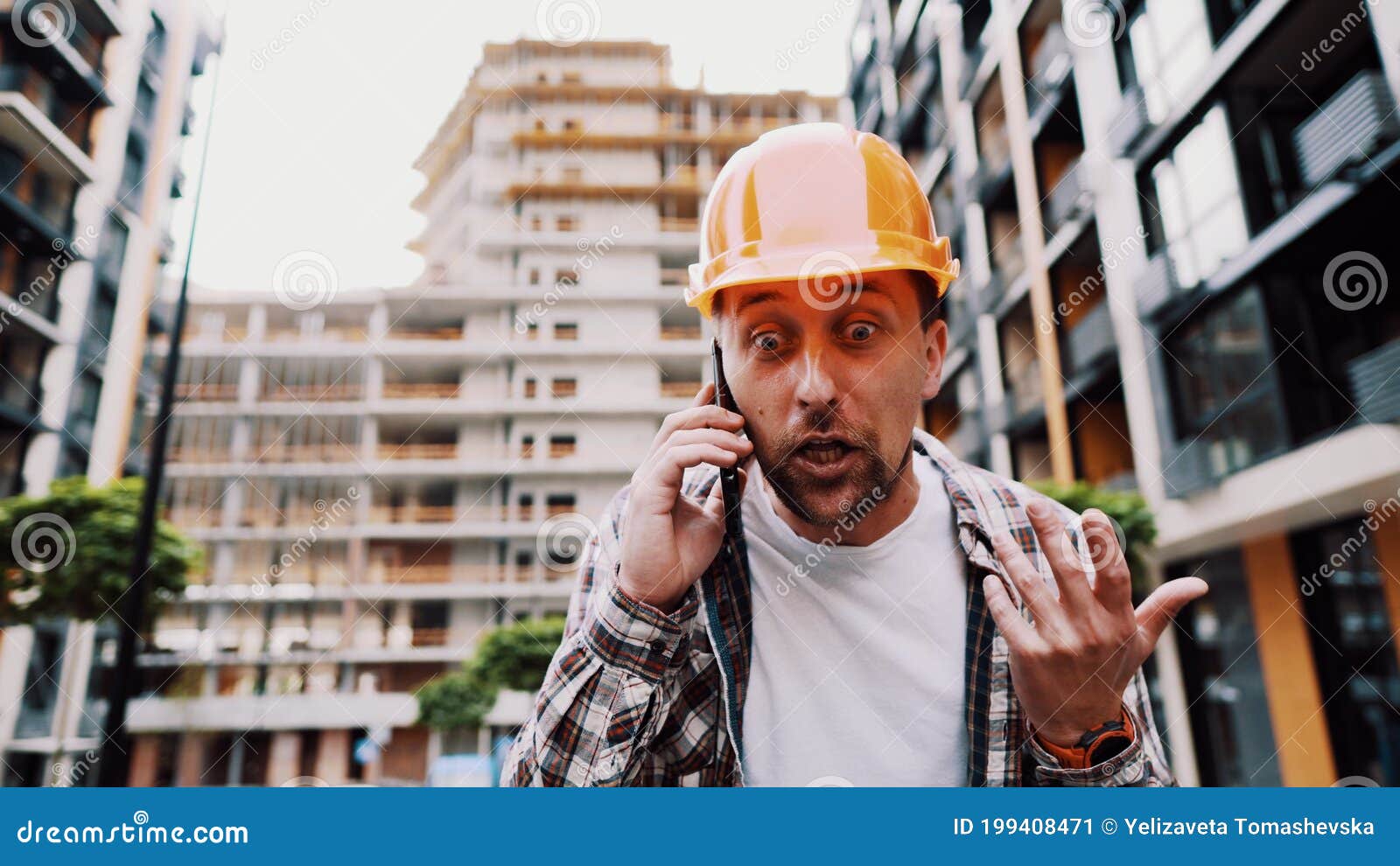 Engineer Talking on Phone. Architect Using Phone on Construction Site ...