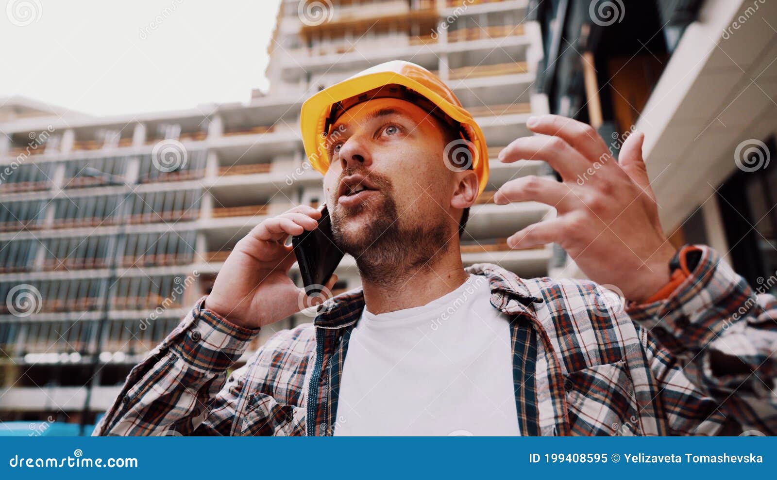 Engineer Talking on Phone. Architect Using Phone on Construction Site ...