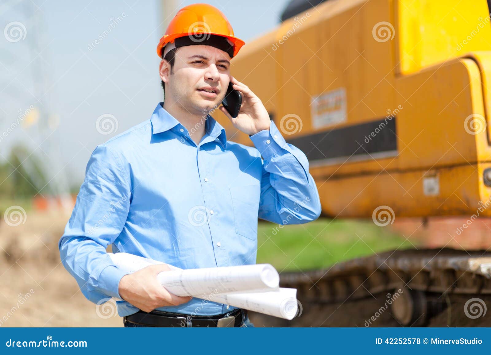 Engineer Talking at the Phone in a Construction Site Stock Photo ...