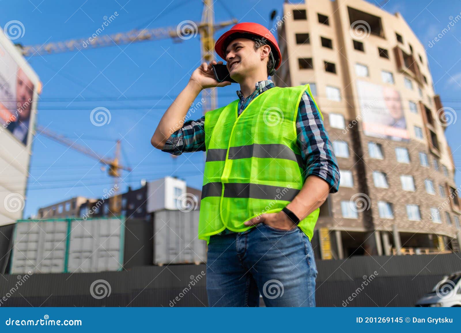 Engineer Man Talking on the Phone on a Construction Site Stock Image ...